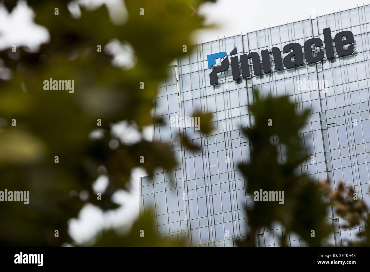 A logo sign outside of the headquarters of Pinnacle Financial Partners ...