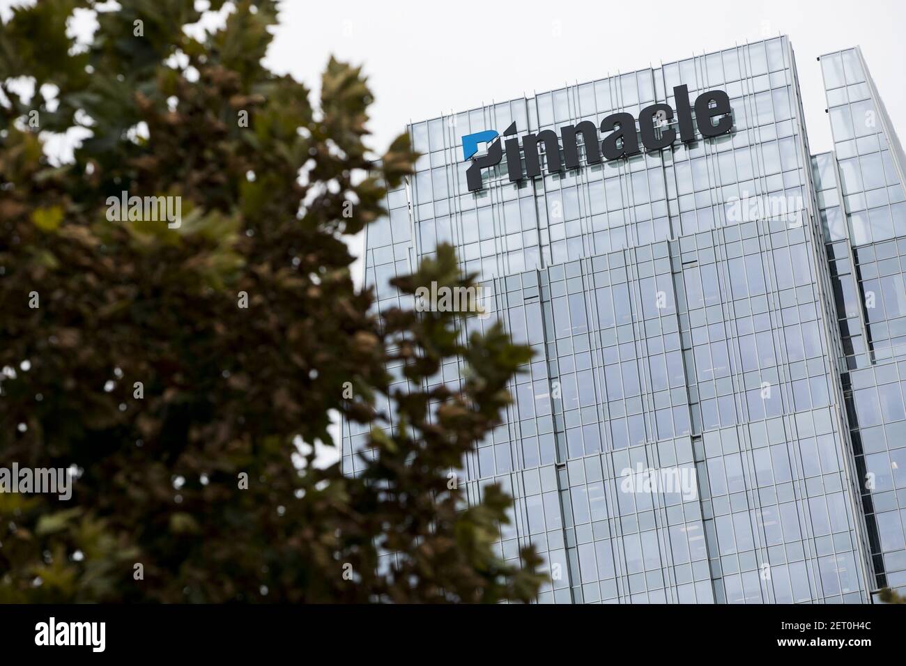 A logo sign outside of the headquarters of Pinnacle Financial Partners ...