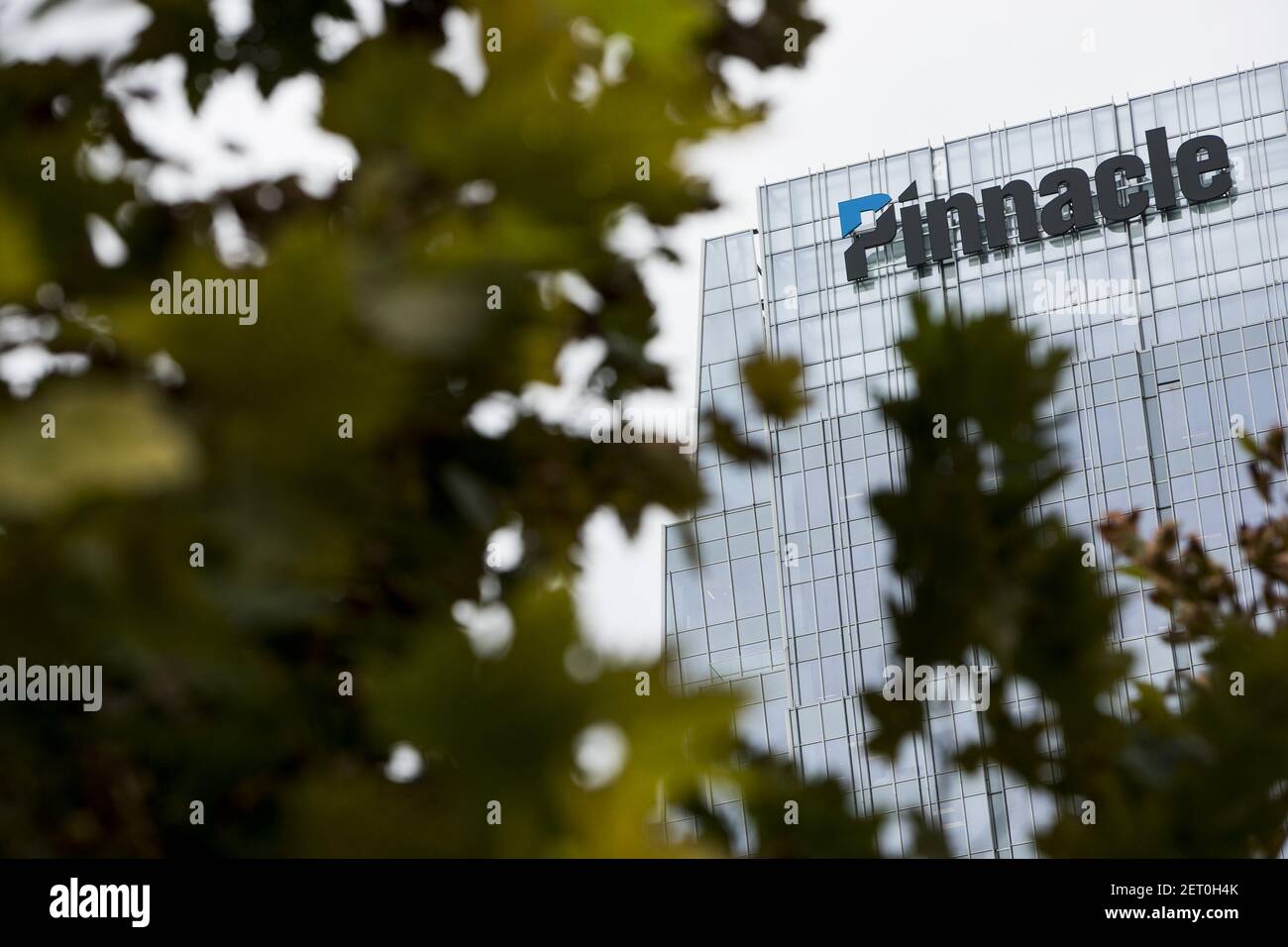 A logo sign outside of the headquarters of Pinnacle Financial Partners ...