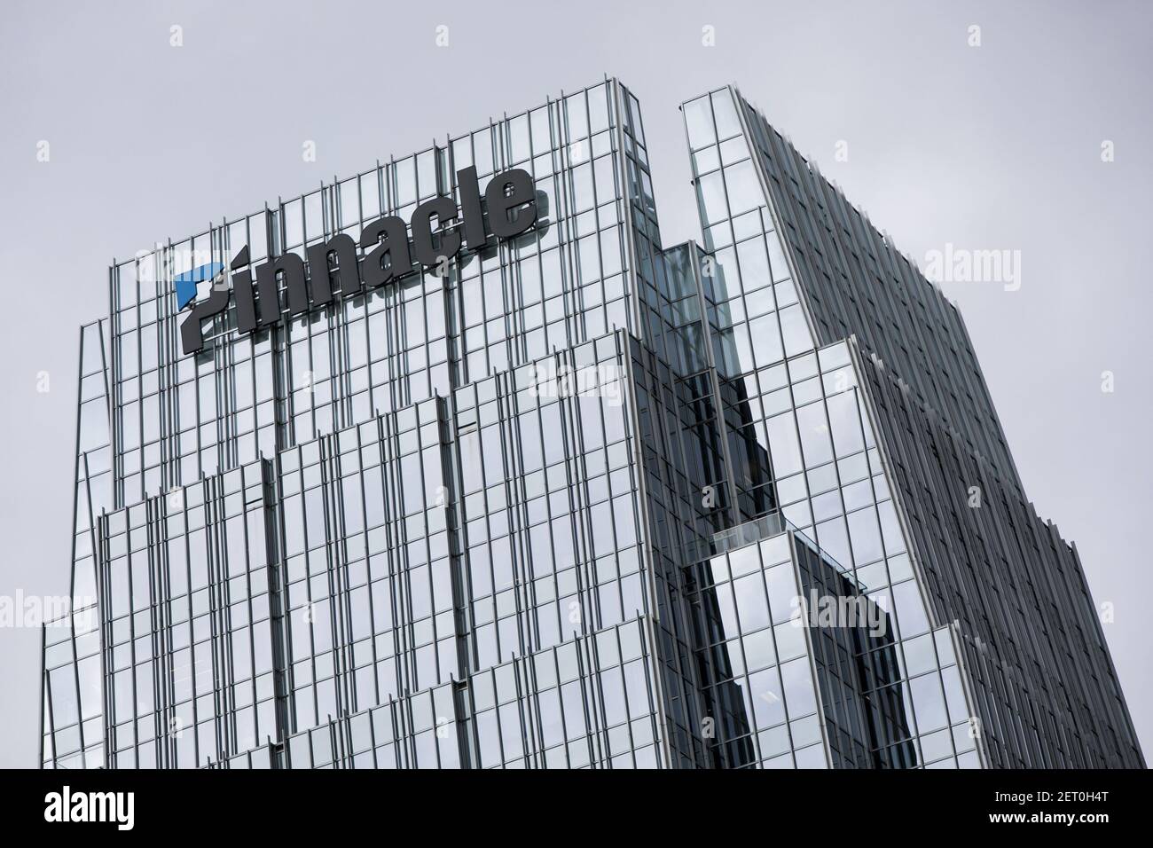 A logo sign outside of the headquarters of Pinnacle Financial Partners ...