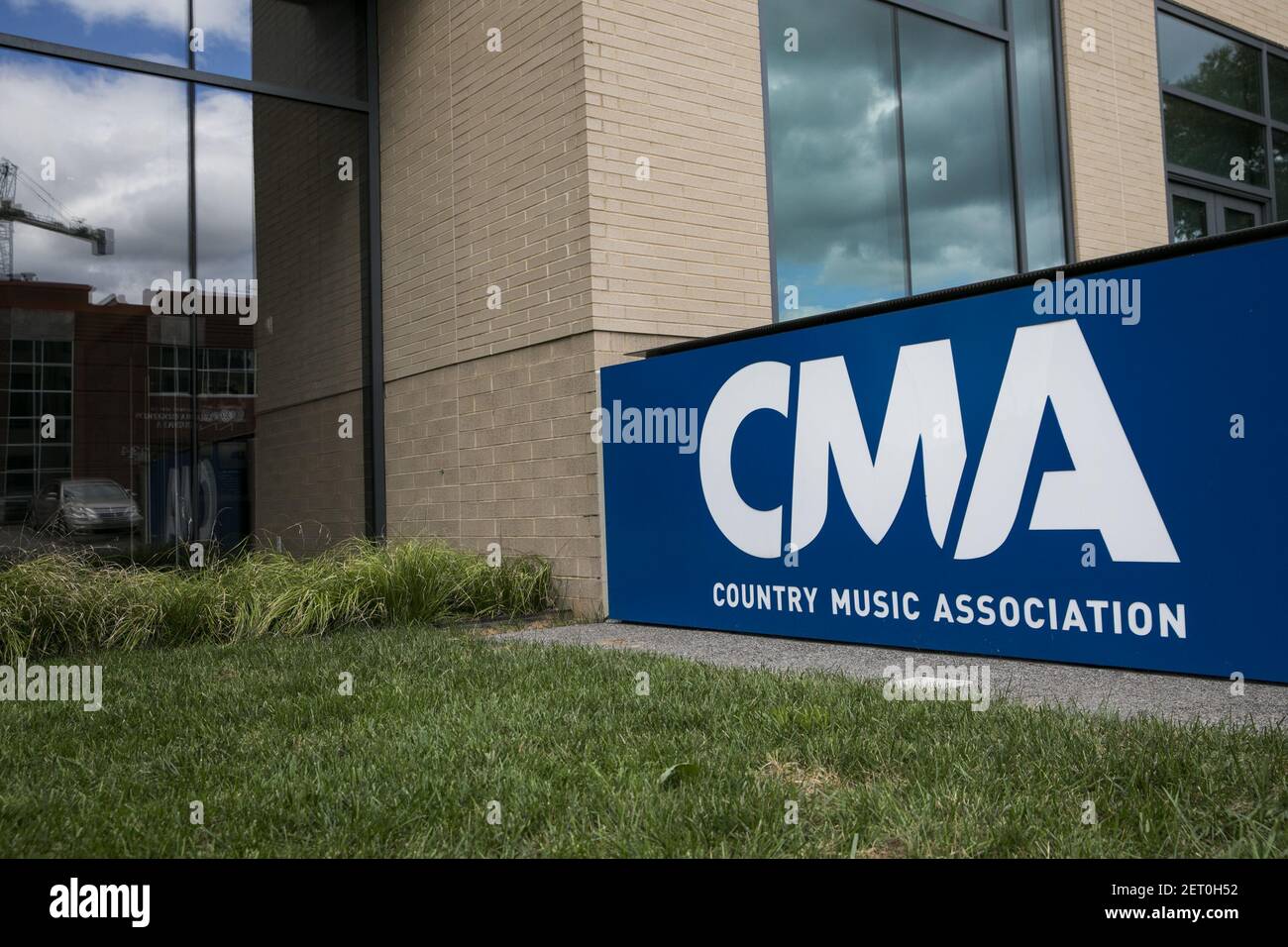 A logo sign outside of the the headquarters of The Country Music ...