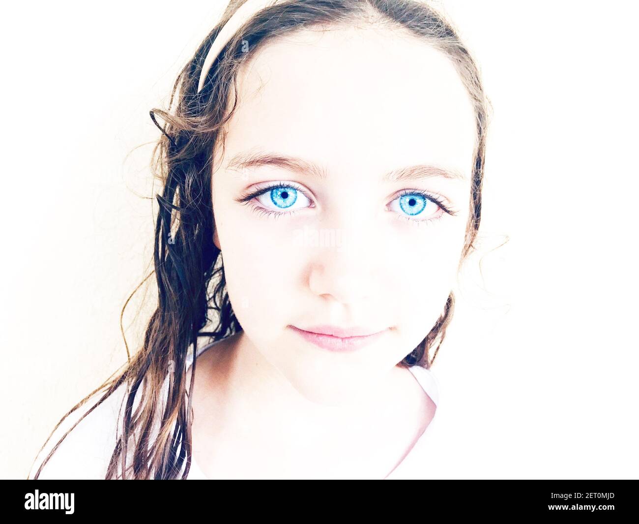 Portrait of a beautiful girl with piercing blue eyes Stock Photo - Alamy