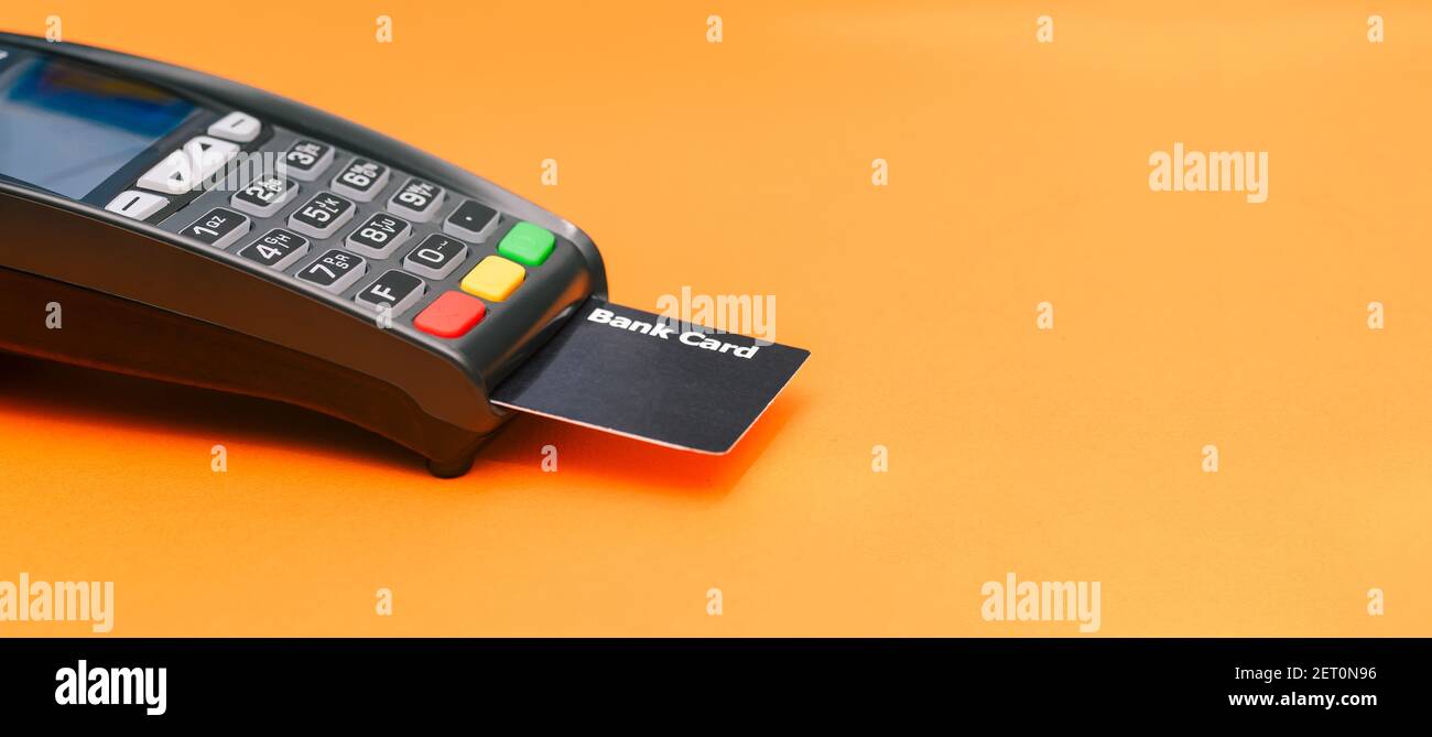 Payment Pos terminal with bank card and copy space. Contactless and ...