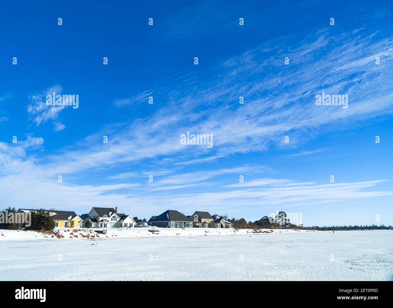 Urban shoreline along a frozen harbor Stock Photo - Alamy