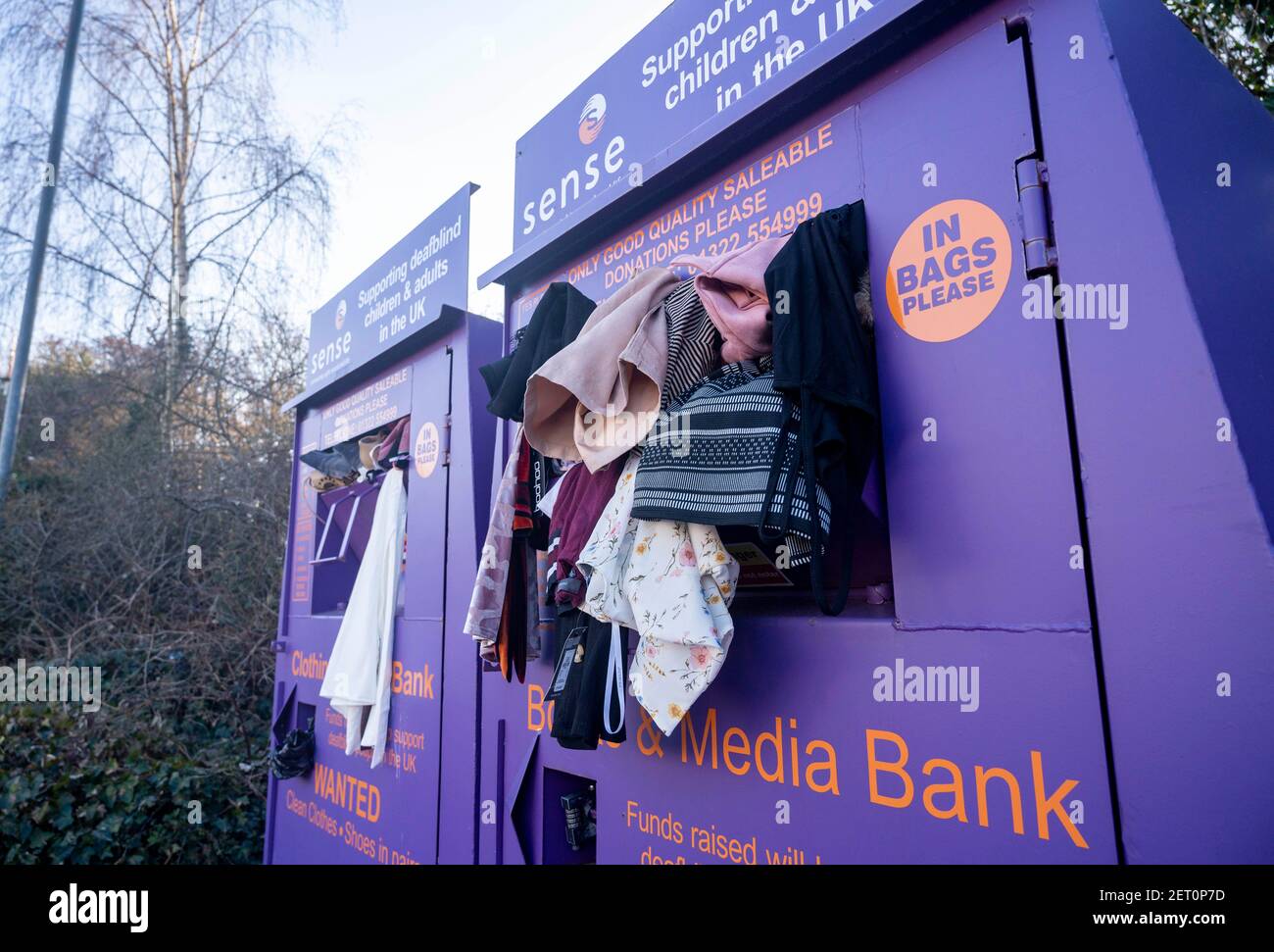 Sense charity clothes bank overflowing in Crawley UK Stock Photo - Alamy