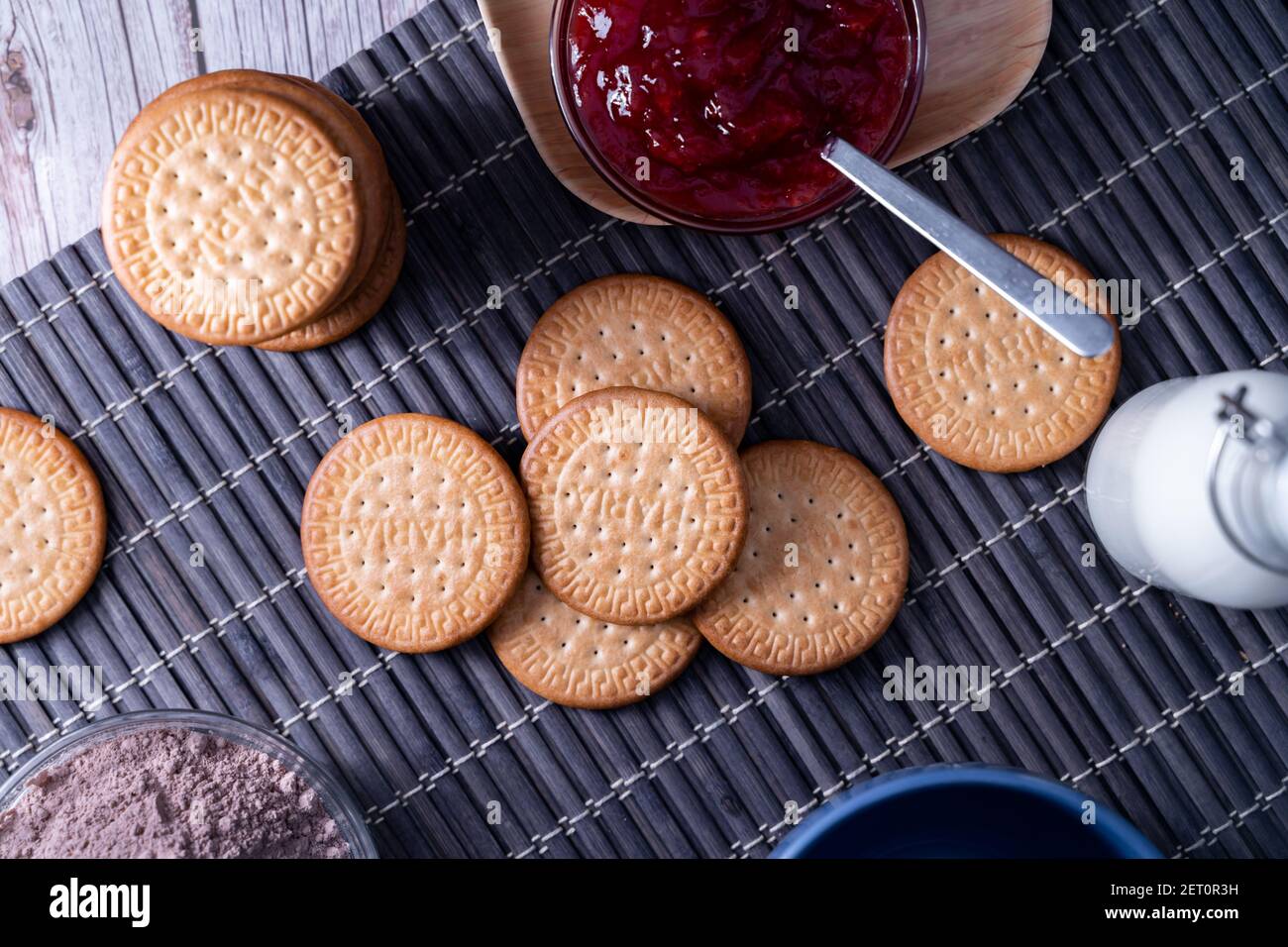 A top view of fresh Maria cookies (galletas Maria), strawberry jam ...
