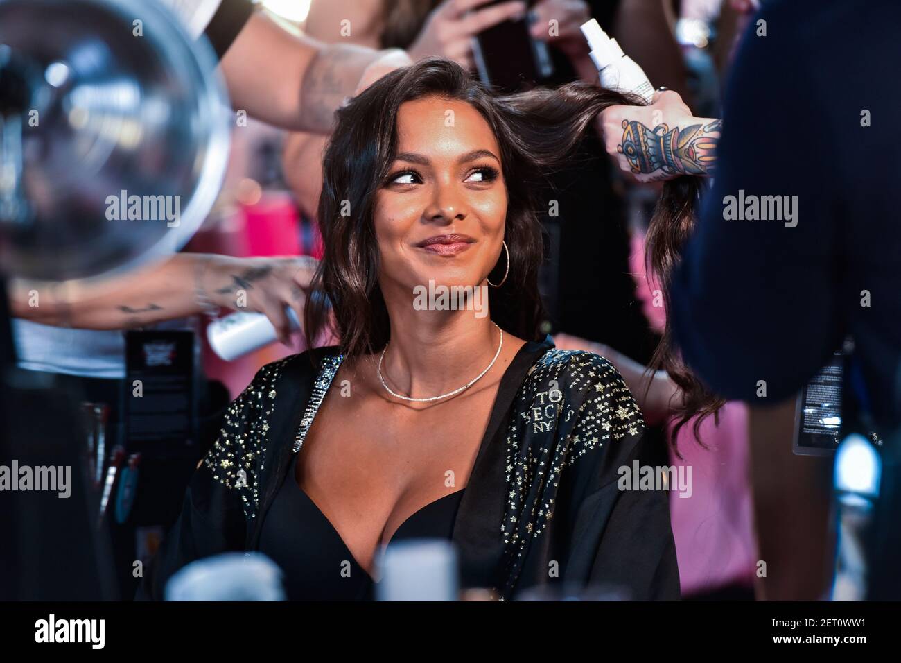 Model Lais Ribeiro gets her hair and makeup done backstage before the ...