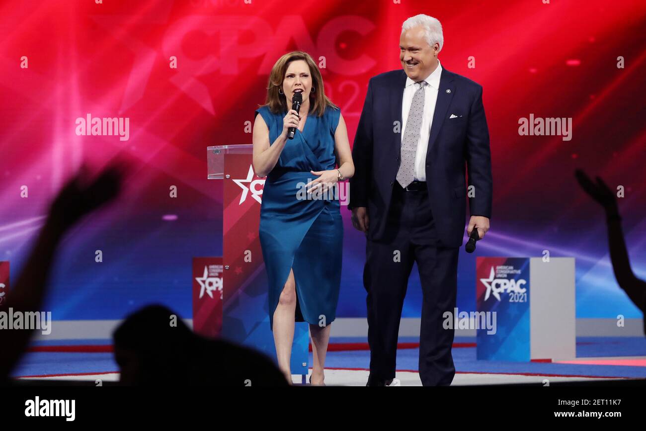 Mercedes and Matt Schlapp walk onstage to a cheering crowd during CPAC ...