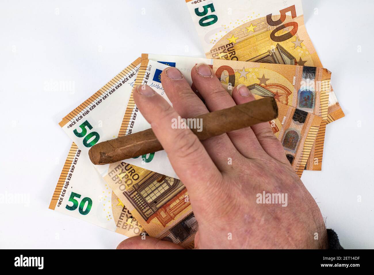 Banker money cigar hi-res stock photography and images - Alamy