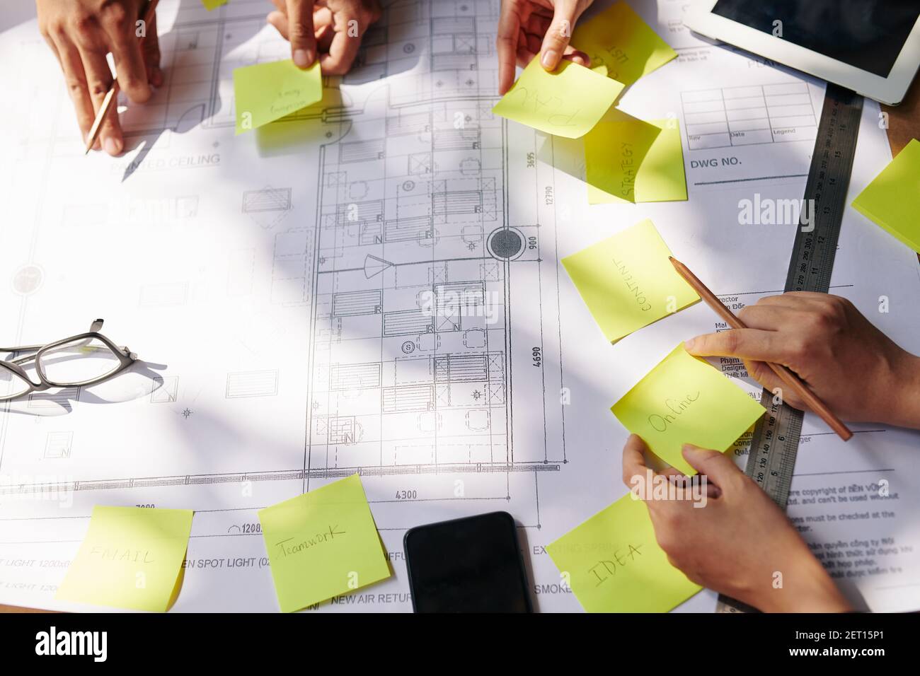 Architects planning work Stock Photo - Alamy