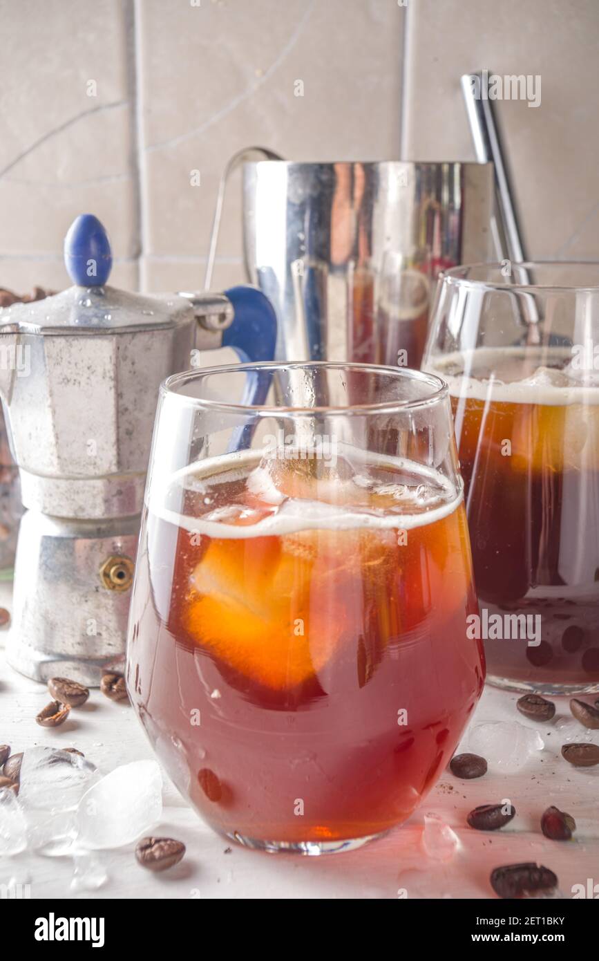 Iced americano espresso coffee without milk, with ice cubes, on white ...