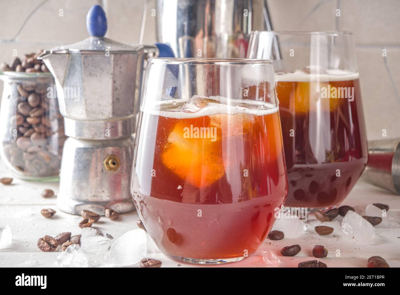 Iced americano espresso coffee without milk, with ice cubes, on white ...