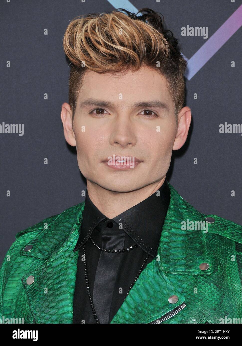 Christian Acosta arrives at the 2018 E! People's Choice Awards held at ...