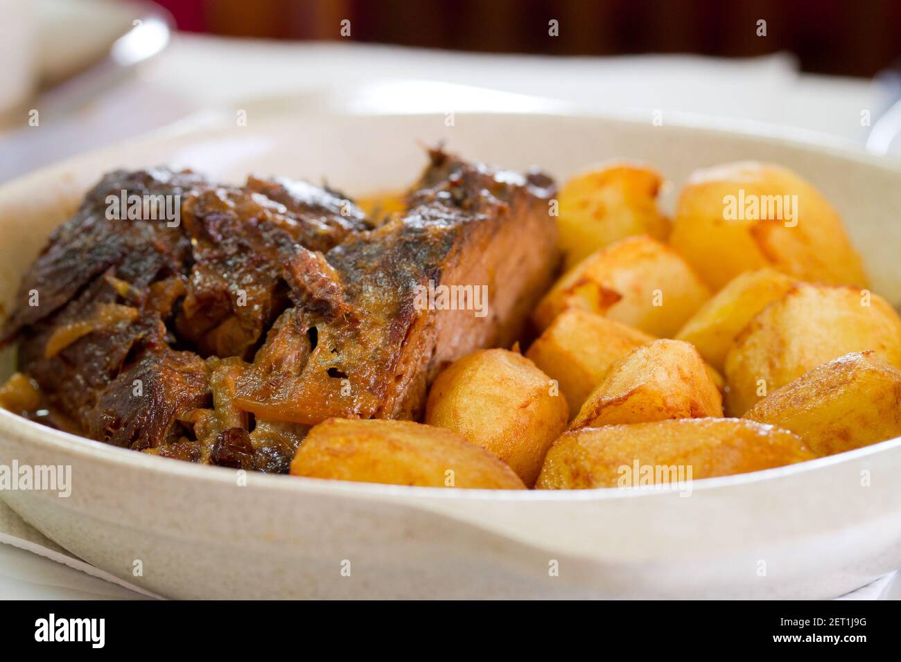 baked meat with potato in dish Stock Photo - Alamy