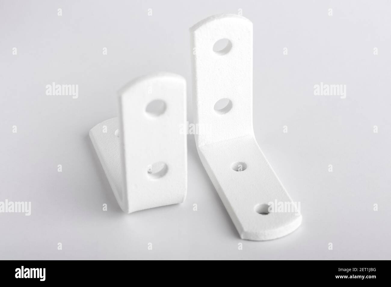 Metal corners for mounting in white on a white background Stock Photo ...