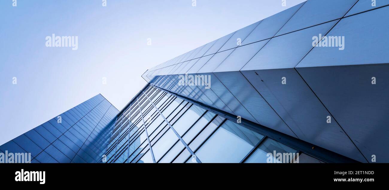 perspective, the skyscraper is directed to the sky. blue gradient ...