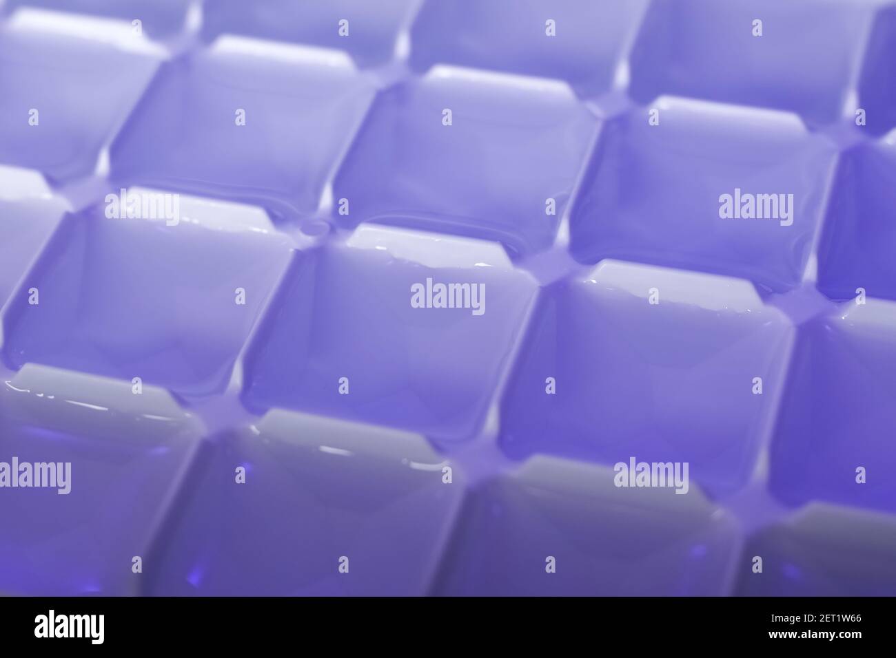 Form for making ice cubes with water. Cold drinks concept Stock Photo ...