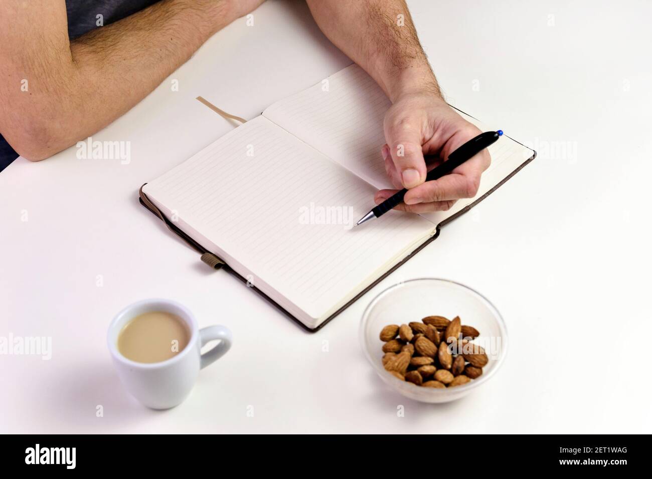 Student hand writing a report hi-res stock photography and images - Alamy