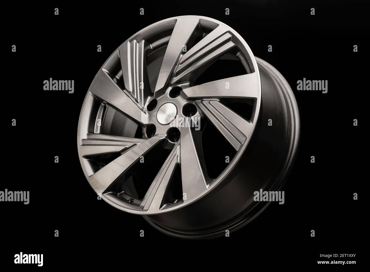 gray alloy wheel modern, close-up side view on a black background Stock ...