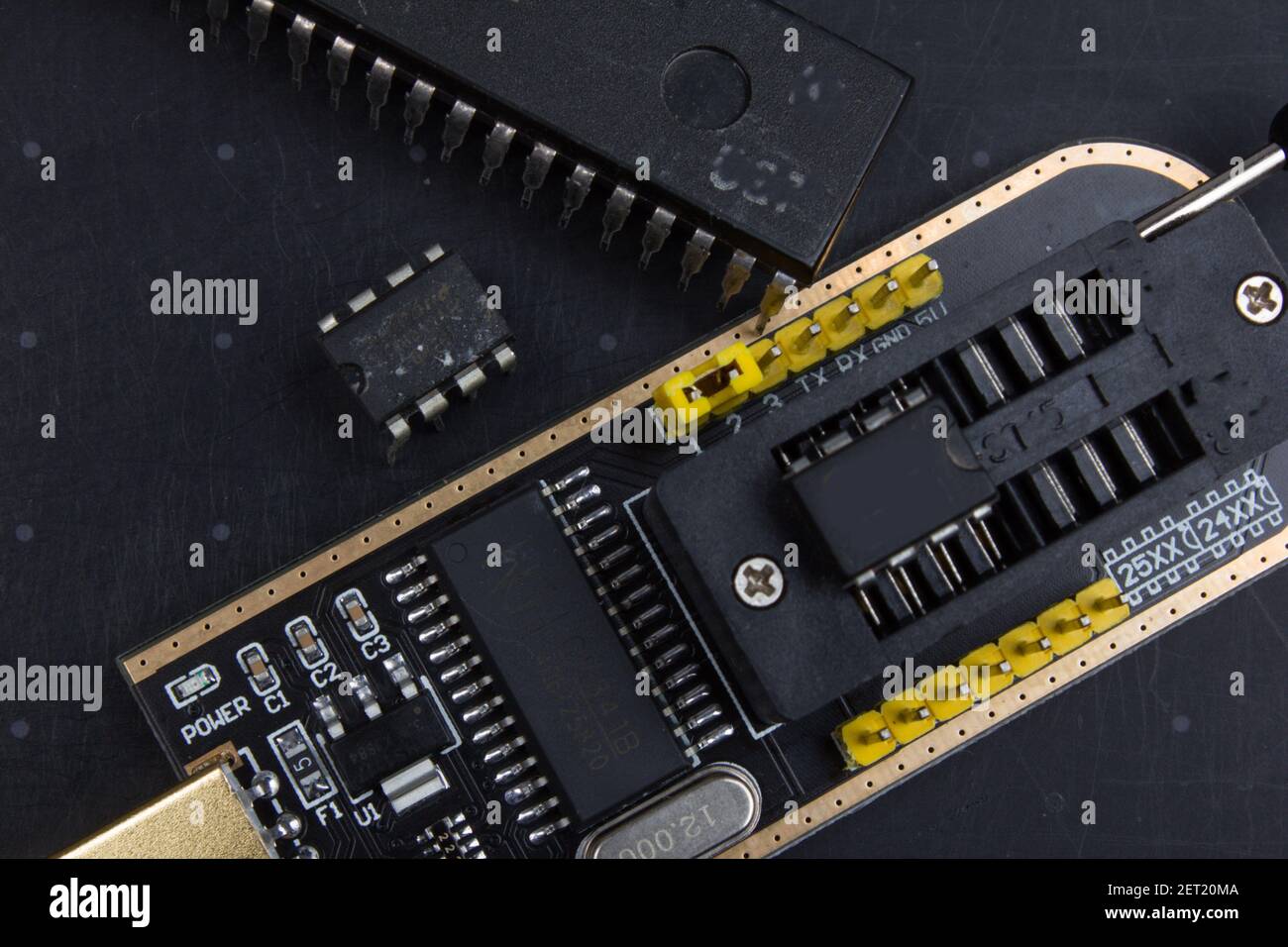 programmer with inserted microchip memory. radio electronics repair ...