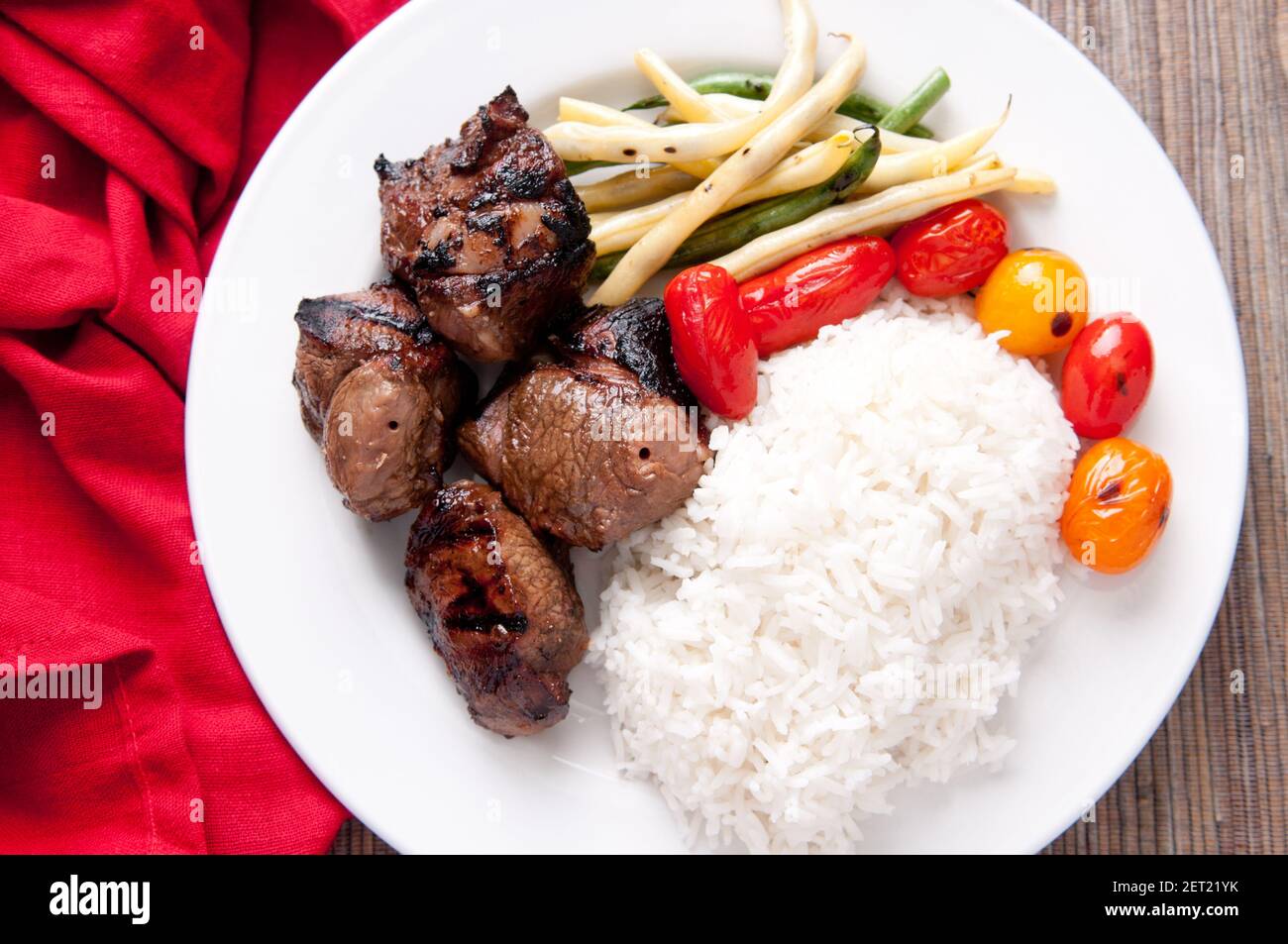 healthy bbq beef kabobs with roasted vegetables and white rice Stock Photo - Alamy
