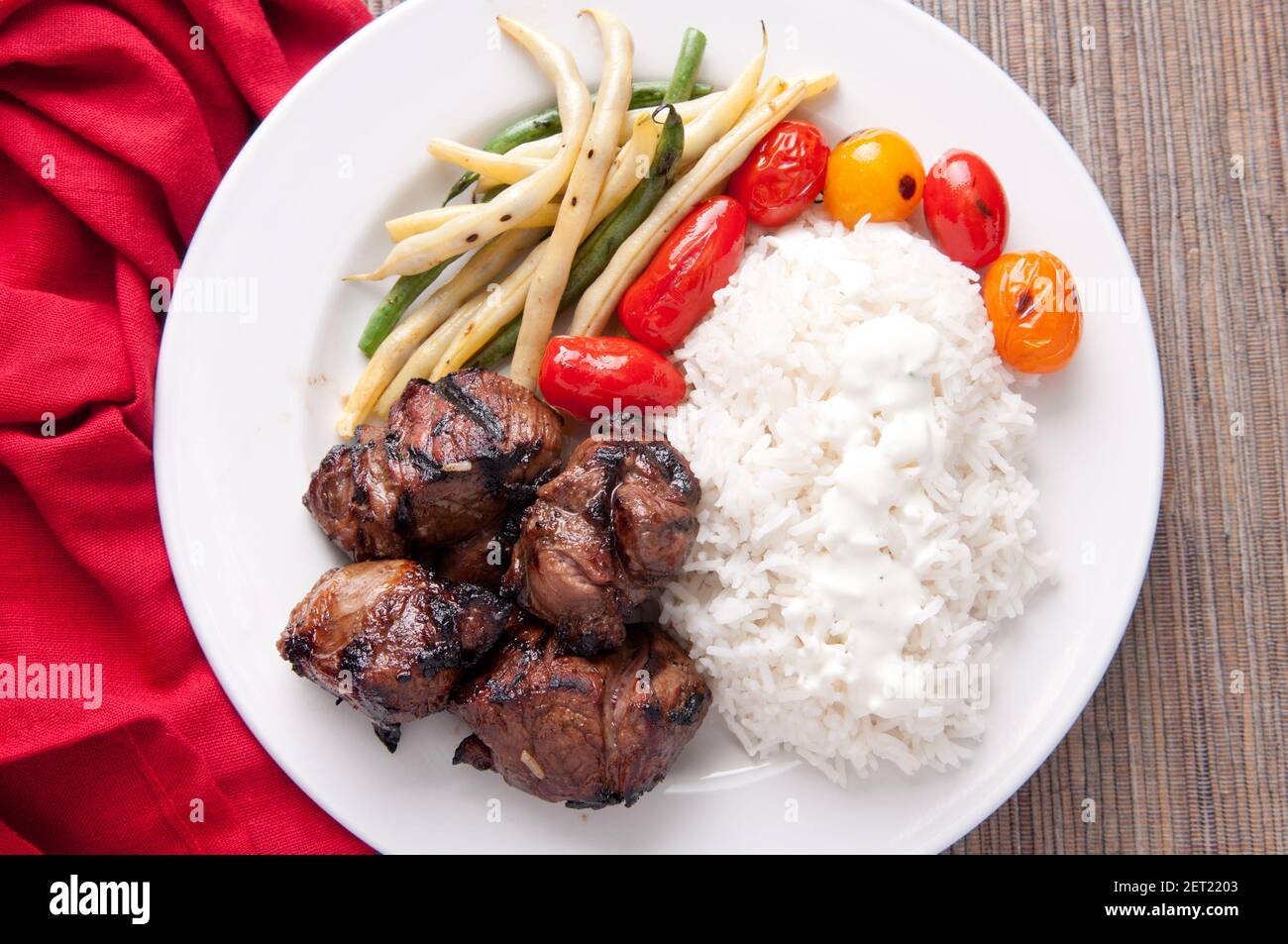 healthy bbq beef kabobs with roasted vegetables and white rice Stock Photo - Alamy