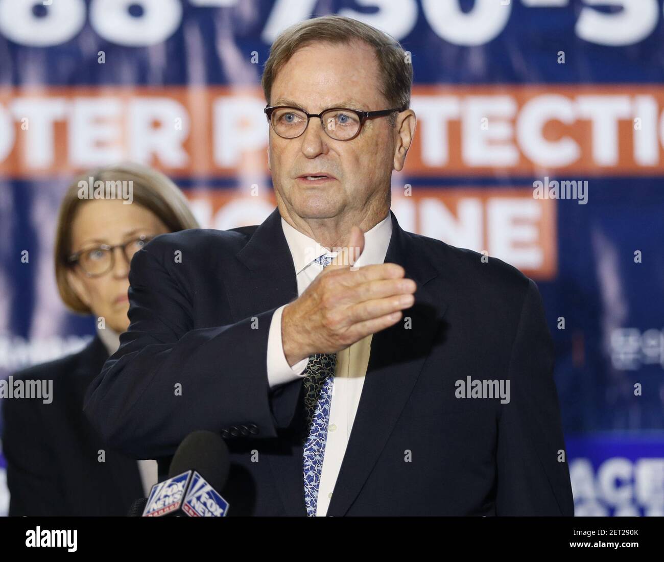 John Chandler, one of Stacey Abrams' attorneys, standing with attorneys ...