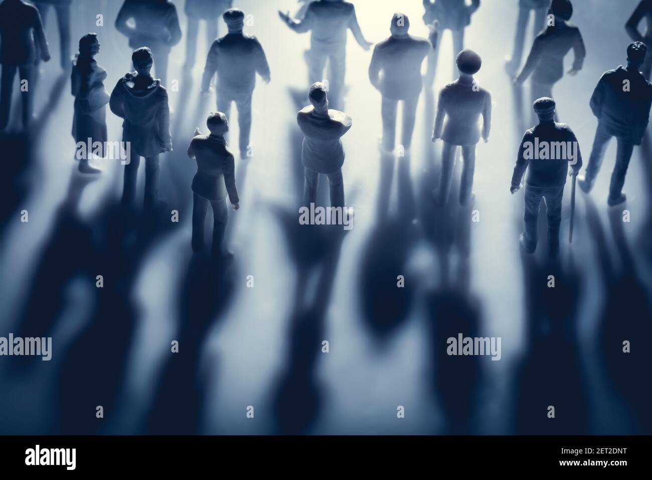 Figures of people and their shadows on light background. High contrast ...