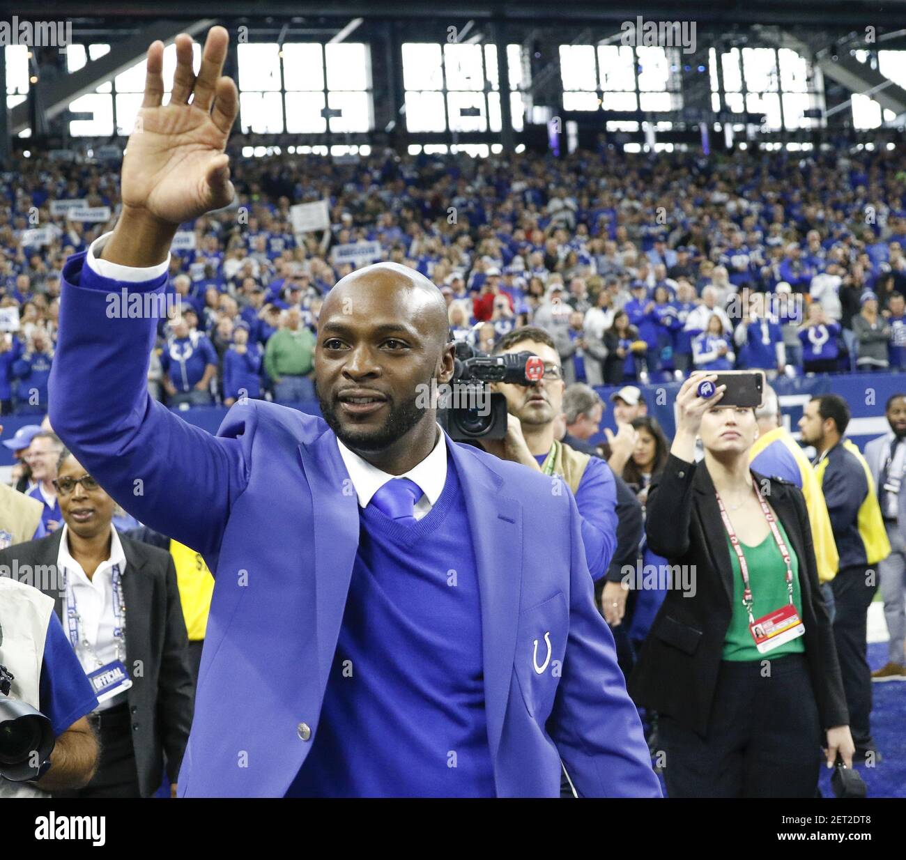 Former Indianapolis Colt Reggie Wayne waves to the crowd on Sunday, Nov ...