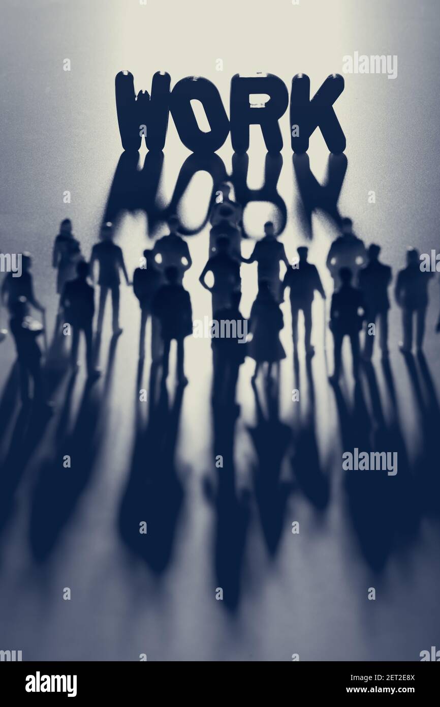 WORK writing and group of people standing in front of it. Business ...