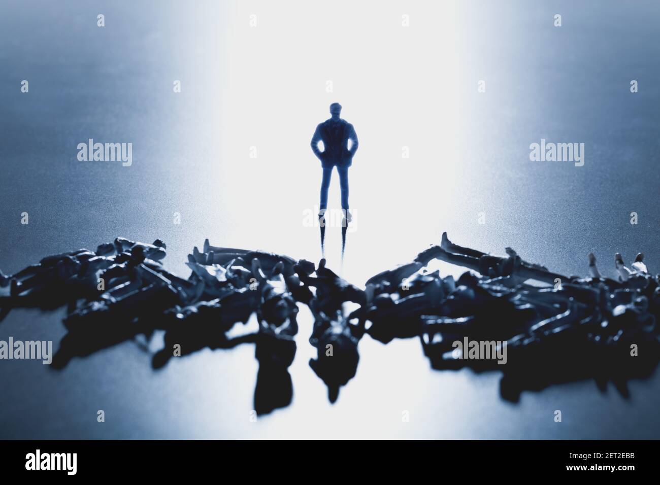One man standing and people laying around. Domination, defeat, conquer ...