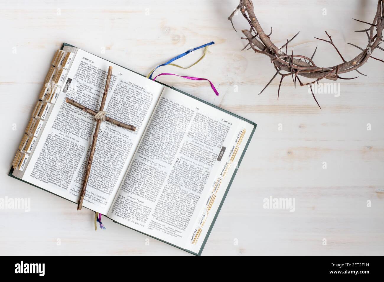 Lent border and background with cross on open bible with crown of ...