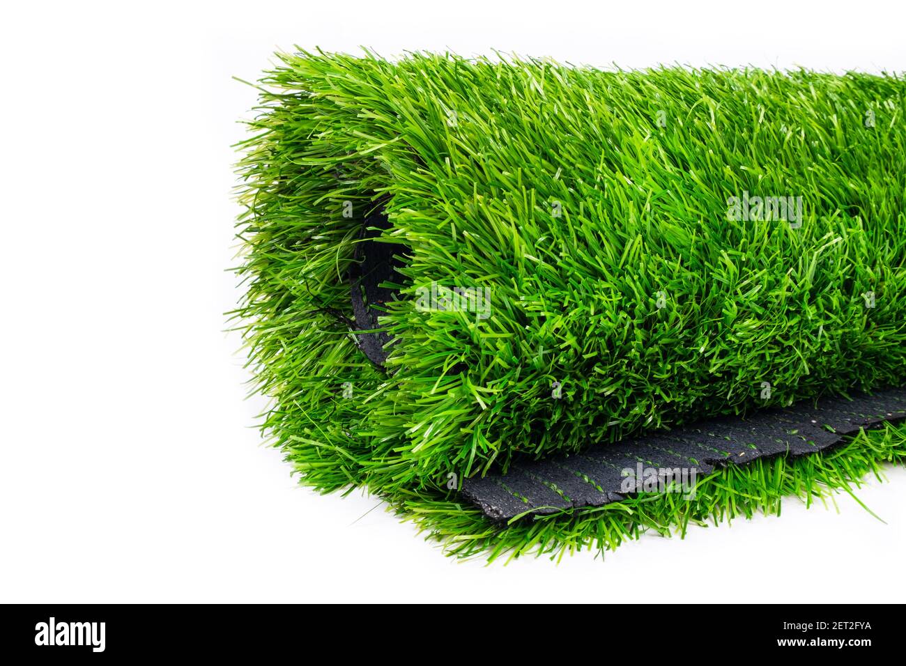 roll of plastic green grass isolated on white background Stock Photo ...
