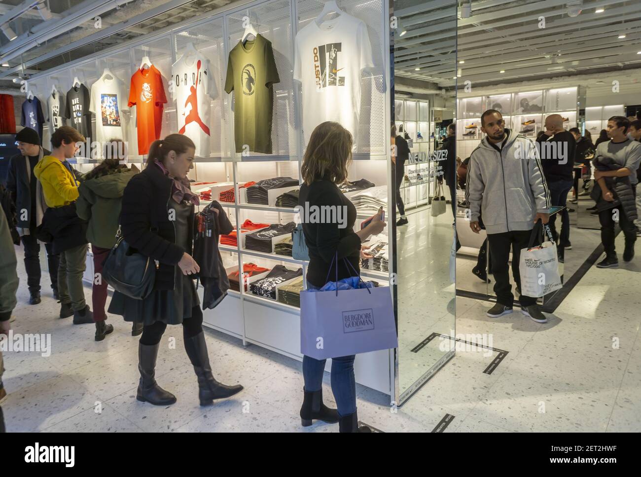 Shoppers and visitors flock to the newly opened Nike flagship store on ...
