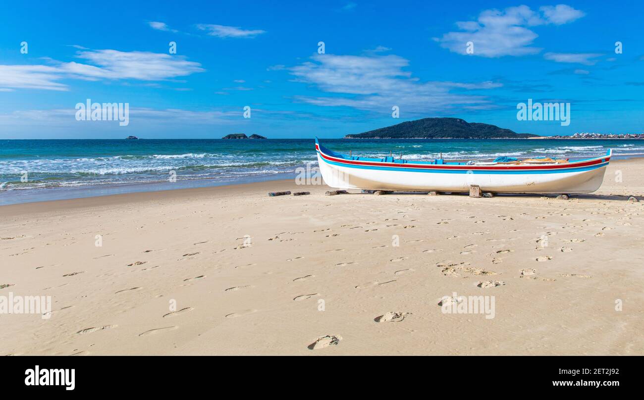 A boat on sandy beach in Brazil Stock Photo - Alamy