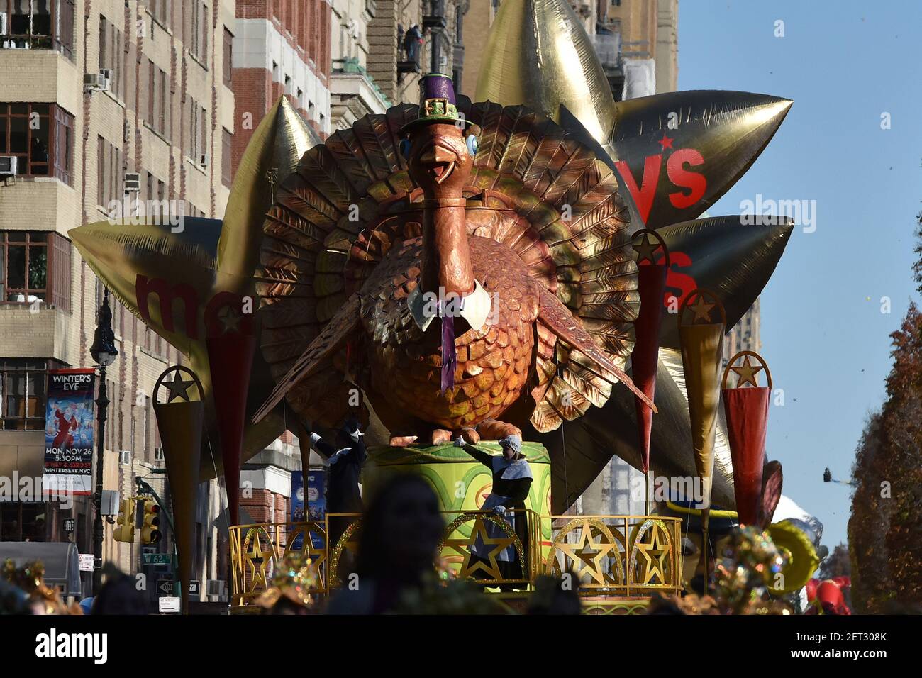 The Macy's Turkey float makes its way down Central Park West during the ...