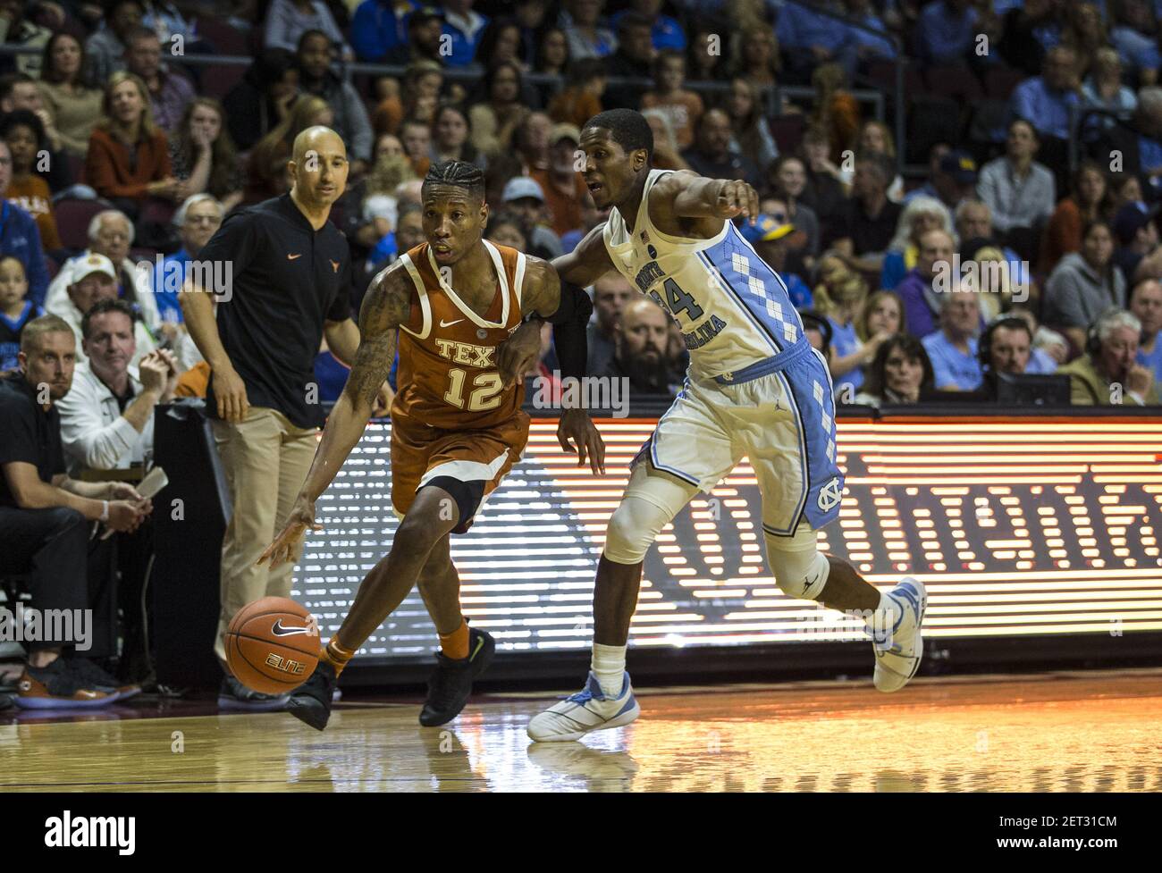 Nov 22 2018 Las Vegas, NV U.S.A. Texas guard Kerwin Roach II (12) brings the ball up court ...