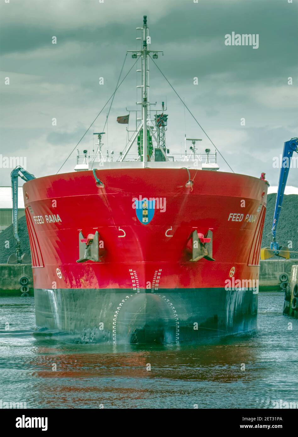 front on shot of the high bow of an unladen cargo ship showing it's ...