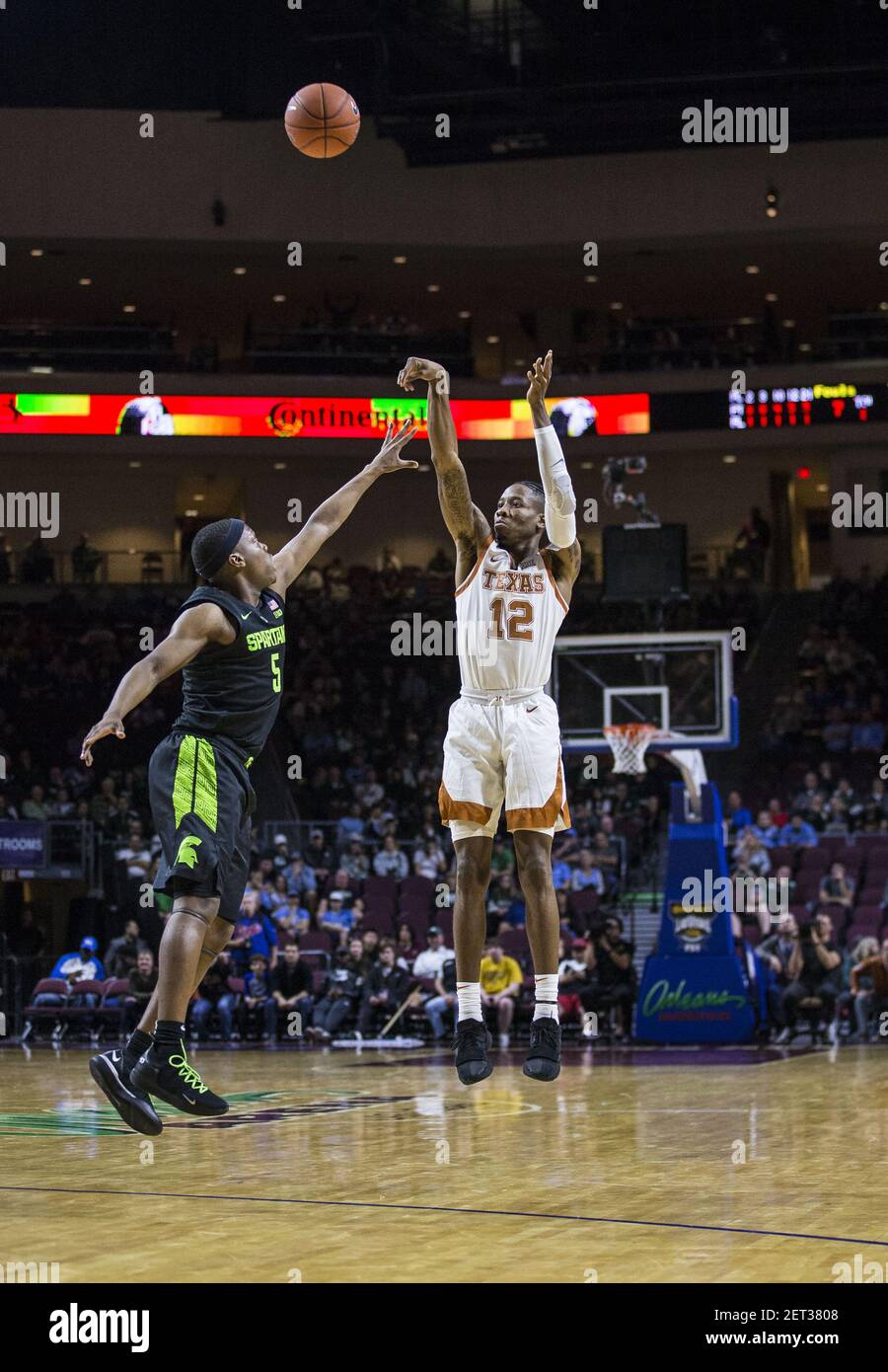 Nov 23 2018 Las Vegas, NV U.S.A. Texas guard Kerwin Roach II (12) takes a jump shot during the ...