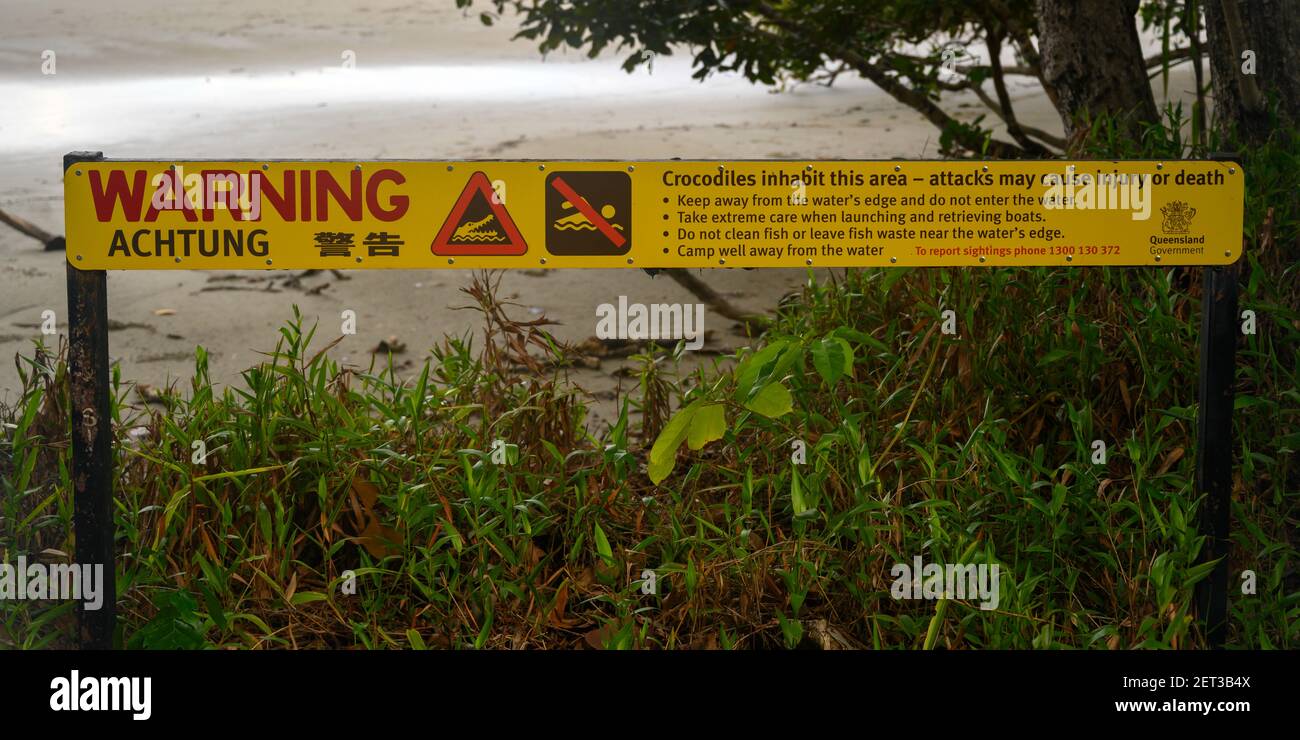 Crocodile warning sign on the beach, Thornton Beach, Far North ...