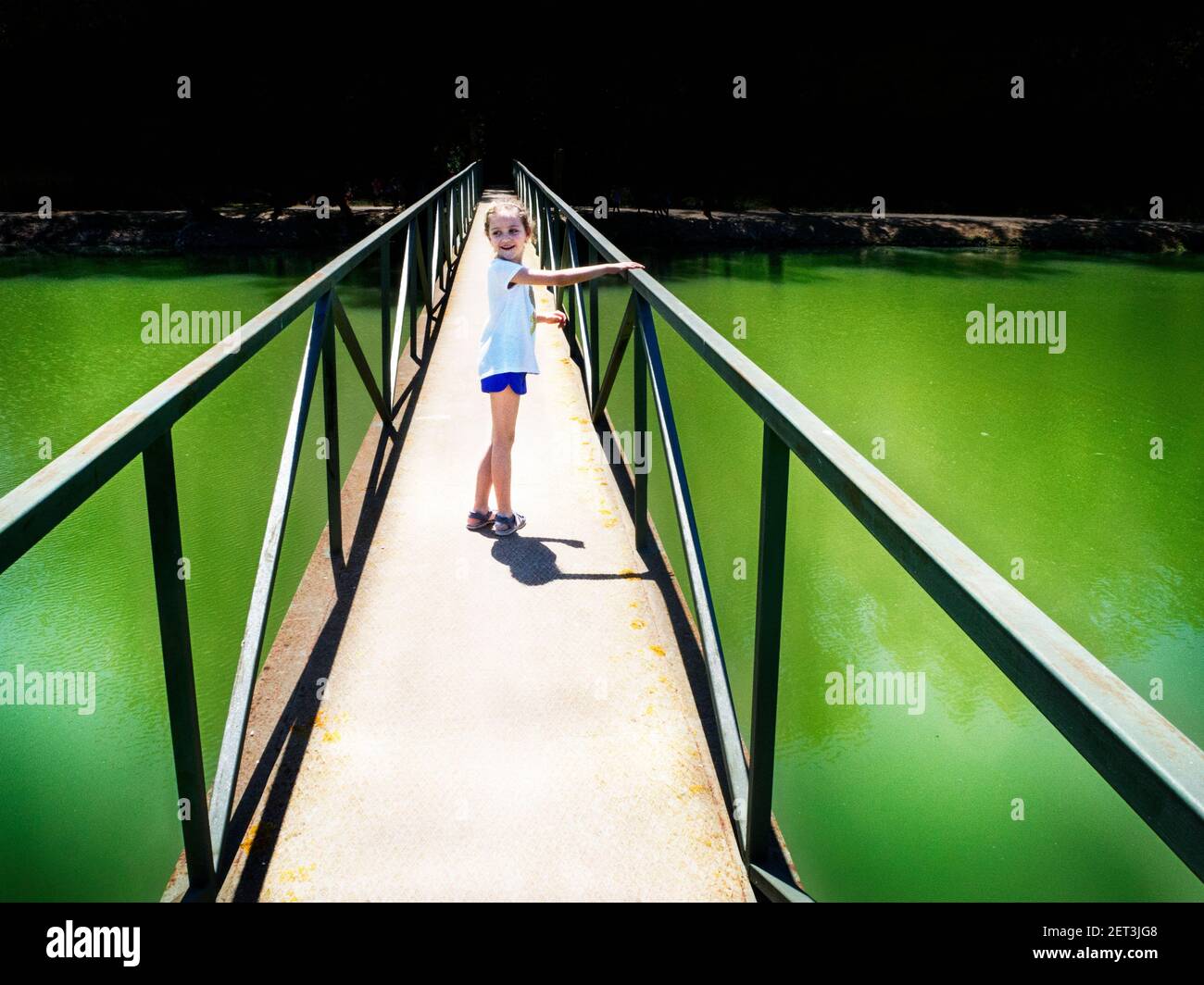 Girl standing bridge hi-res stock photography and images - Alamy