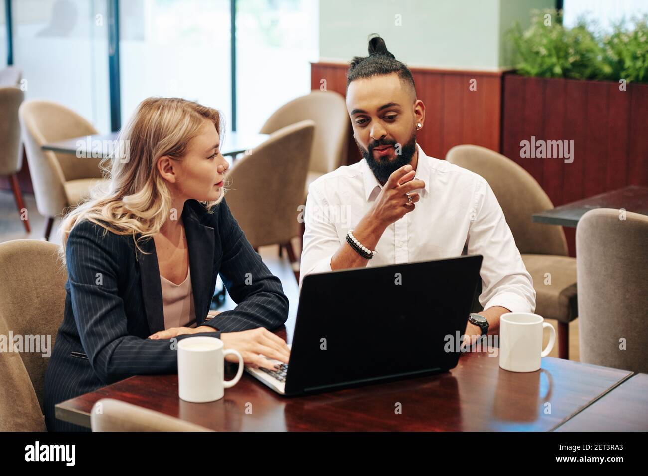Business people watching presentation Stock Photo - Alamy Business people watching presentation Stock Photo - Alamy
