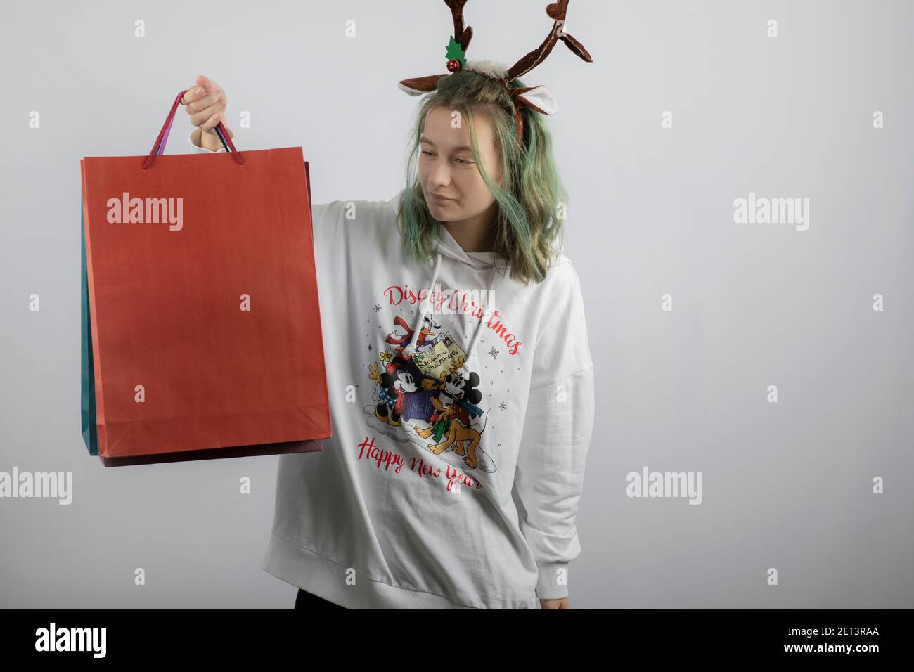 Picture of a young girl model holding colorful shopping bags Stock ...