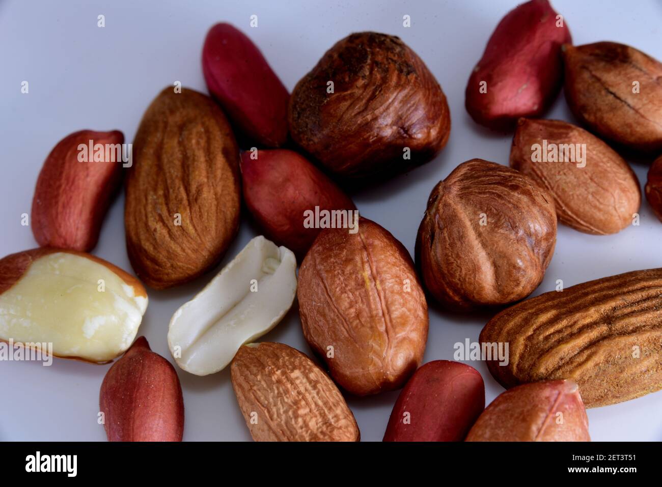 Mixed nuts on white background Stock Photo - Alamy