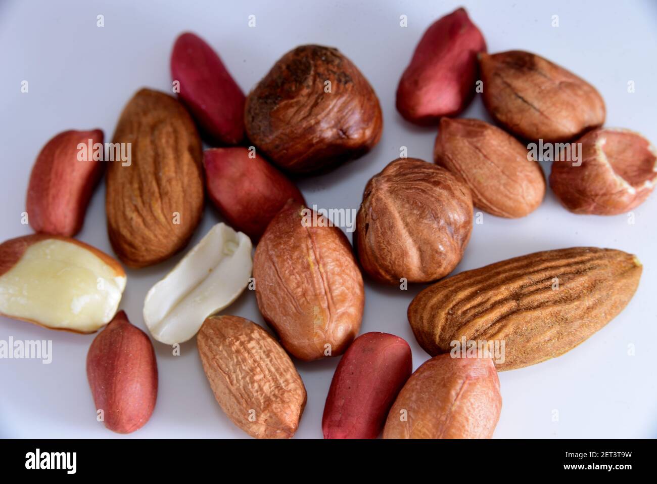 Mixed nuts on white background Stock Photo - Alamy