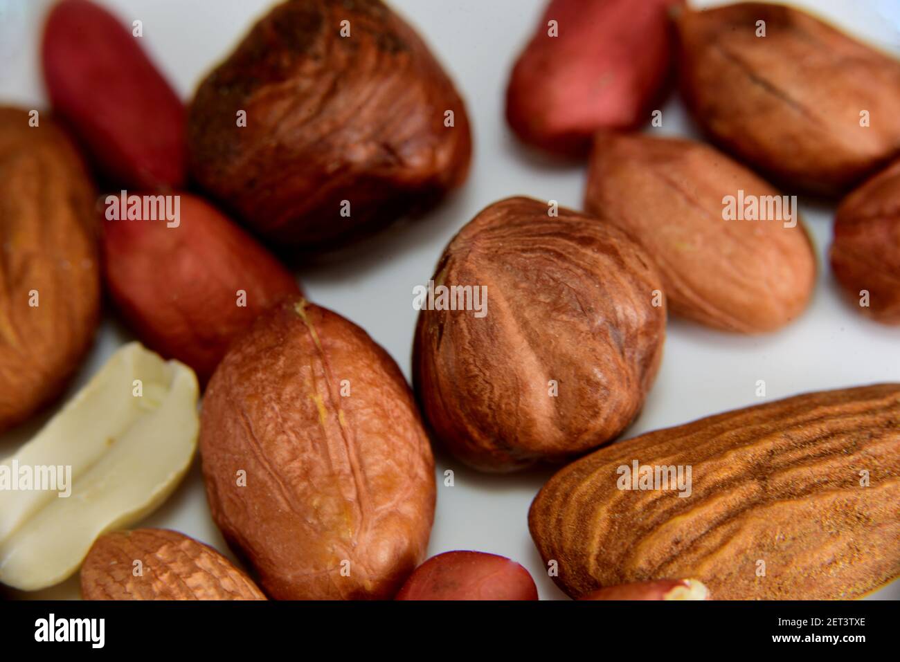 Mixed nuts on white background Stock Photo - Alamy
