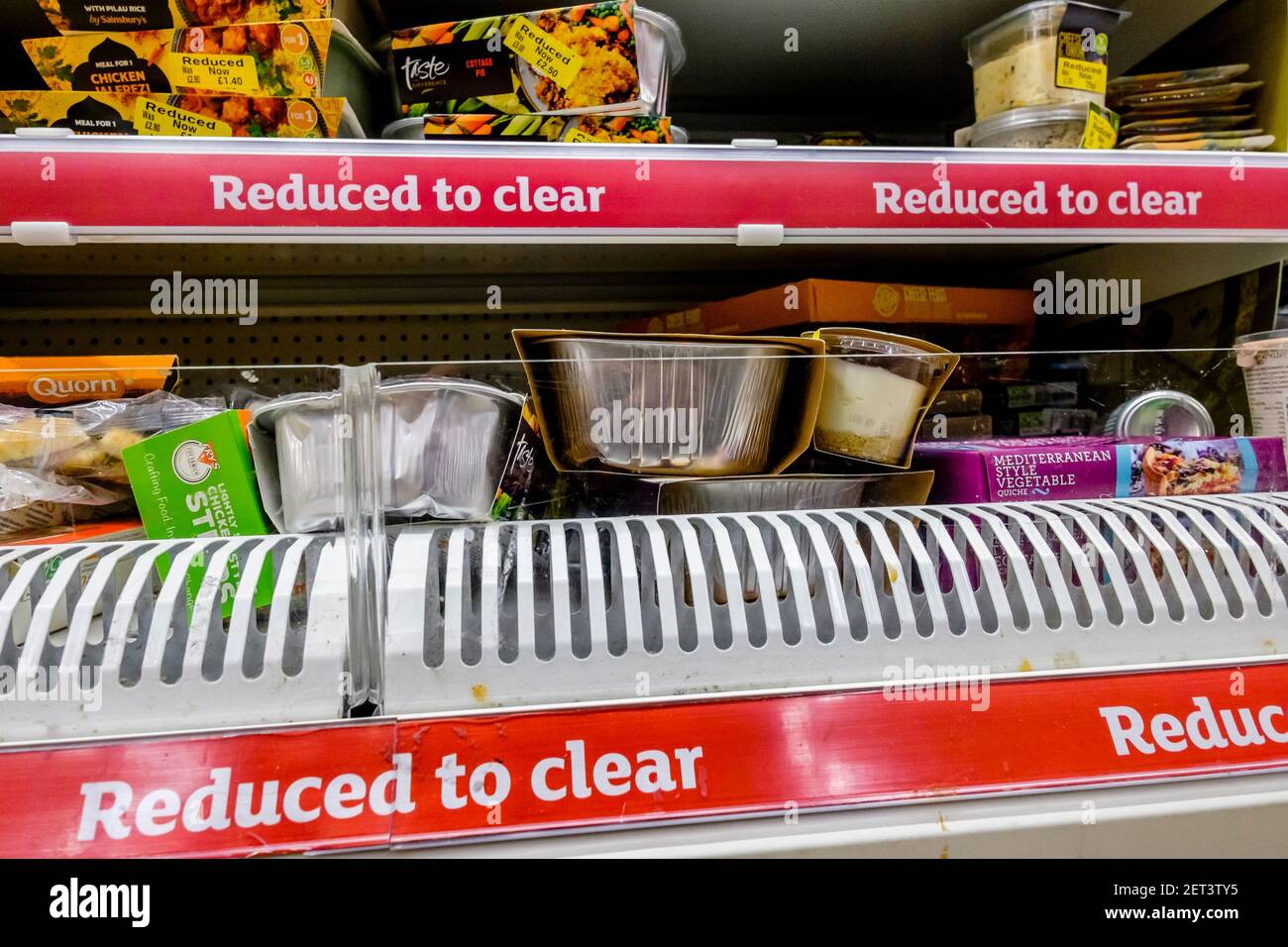 Reduced to clear food items on supermarket shelf, United Kingdom Stock ...