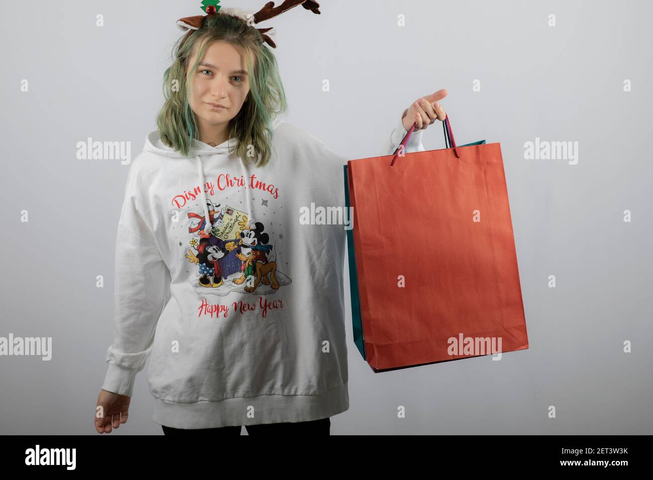 Picture of a young girl model holding colorful shopping bags Stock ...