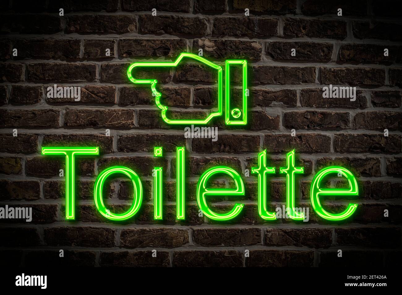 Detail photo of a neon sign on a wall with the inscription Toilette ...