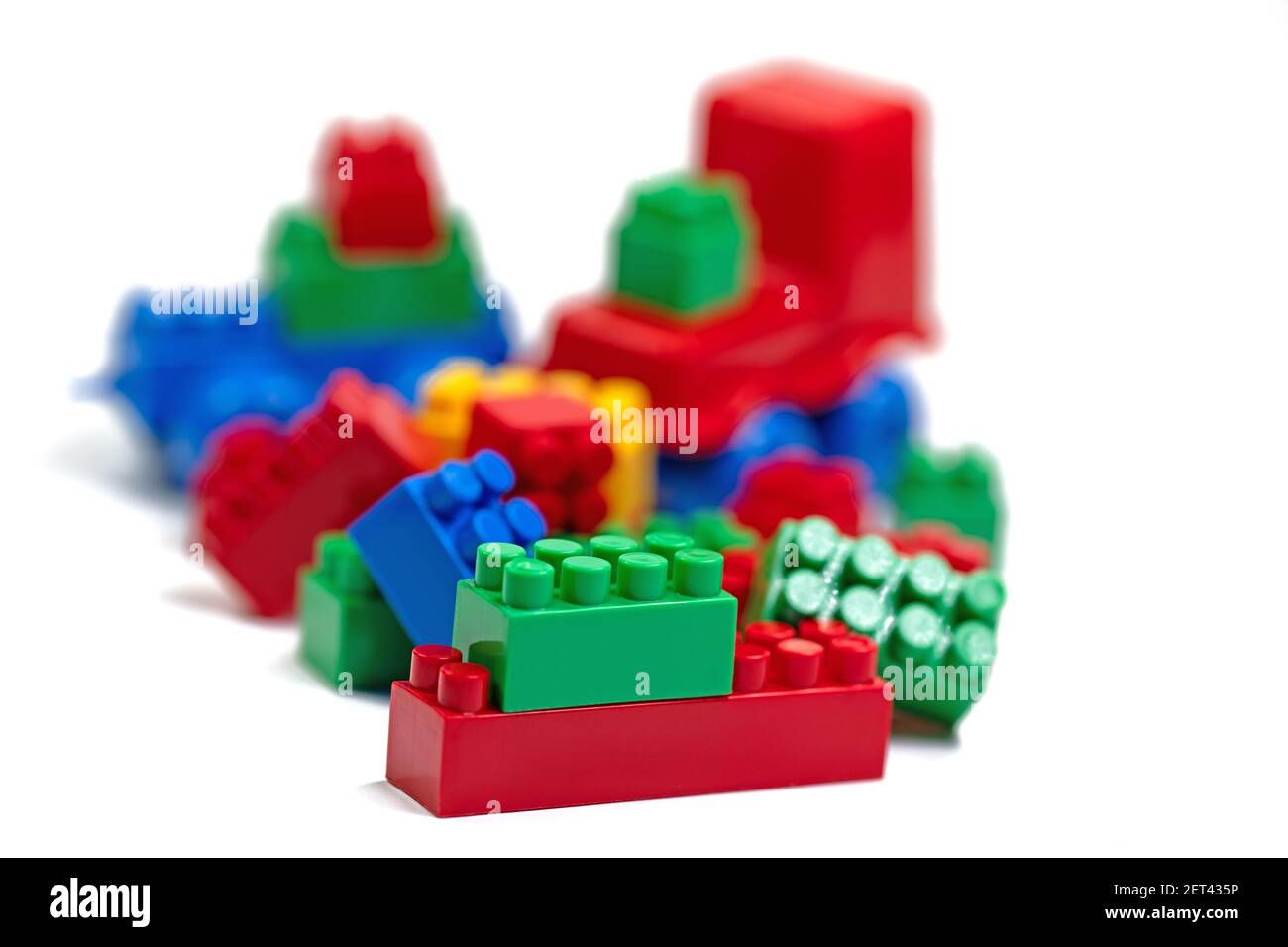 Colorful plastic building blocks against a white background Stock Photo ...